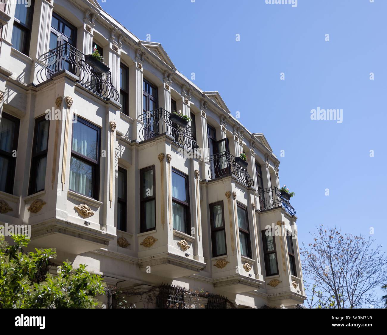 Elegant Historical Building Facade with Wrought Iron Balconies Stock ...