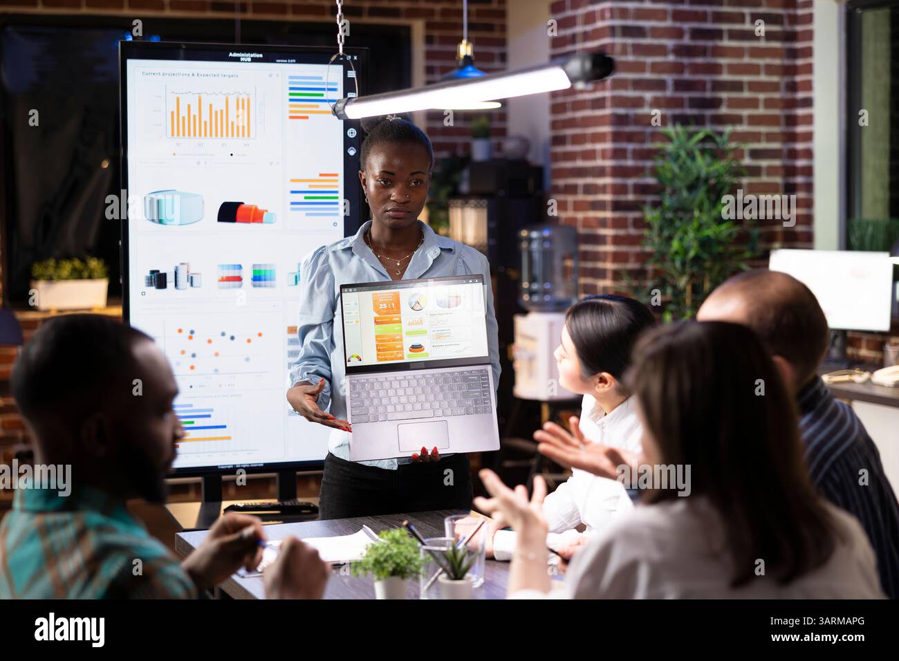 Focused female manager presents hi-res stock photography and images - Alamy