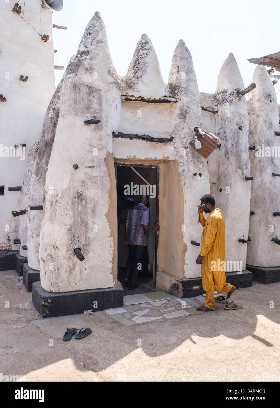 Ghana, Banda Nkwanta. Sudanic Style Mosque. Men Entering the Mosque at ...