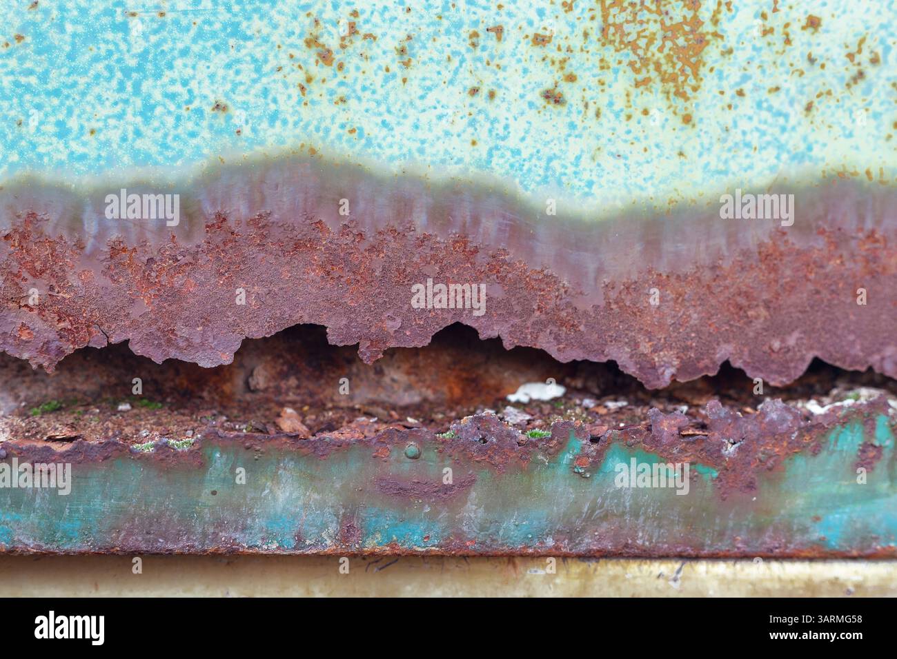 Heavily weathered metal background - Rusted iron surface with eroded ...