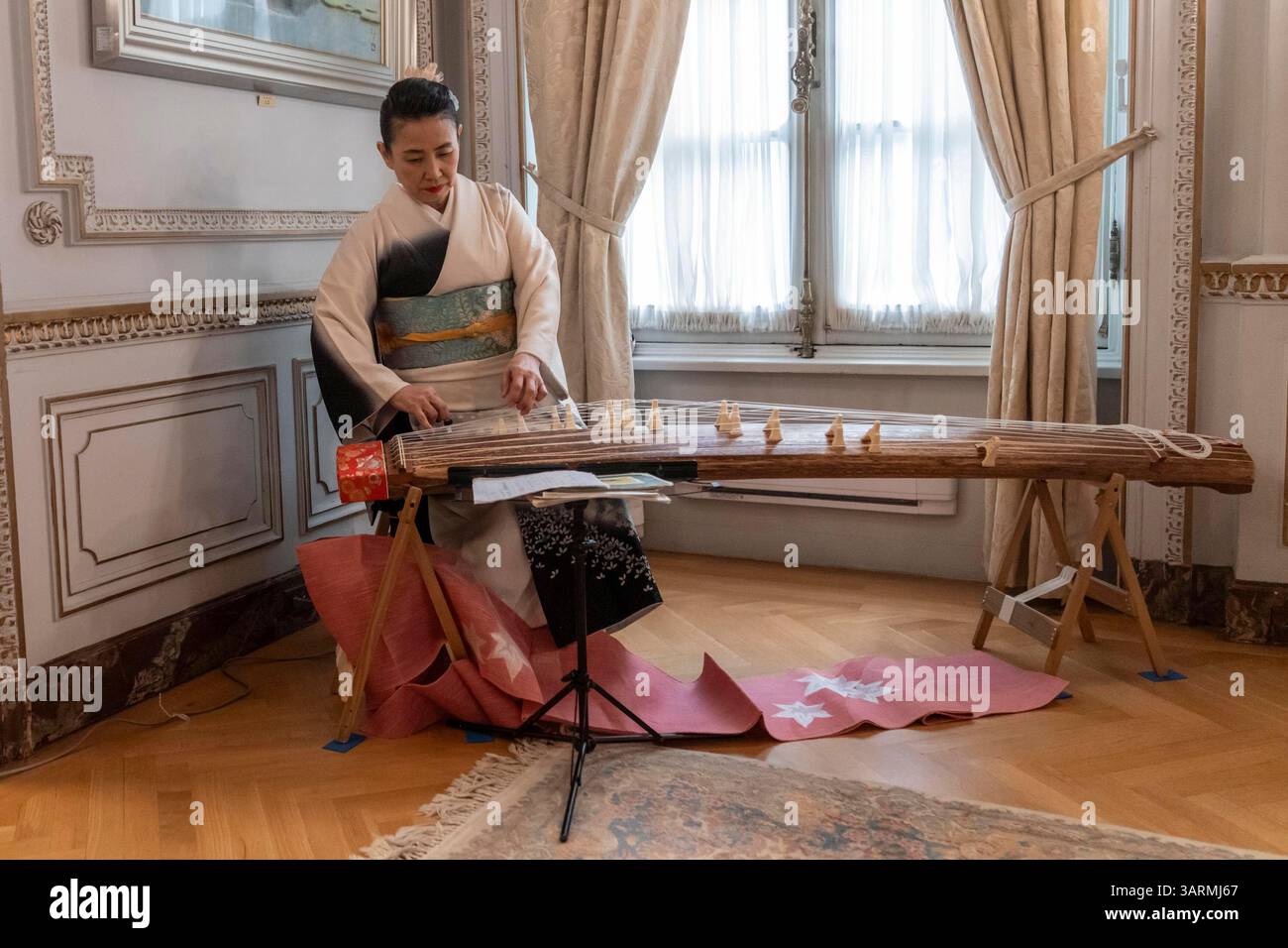 New York, New York, USA. 17th Apr, 2025. Japanese koto player Masayo ...
