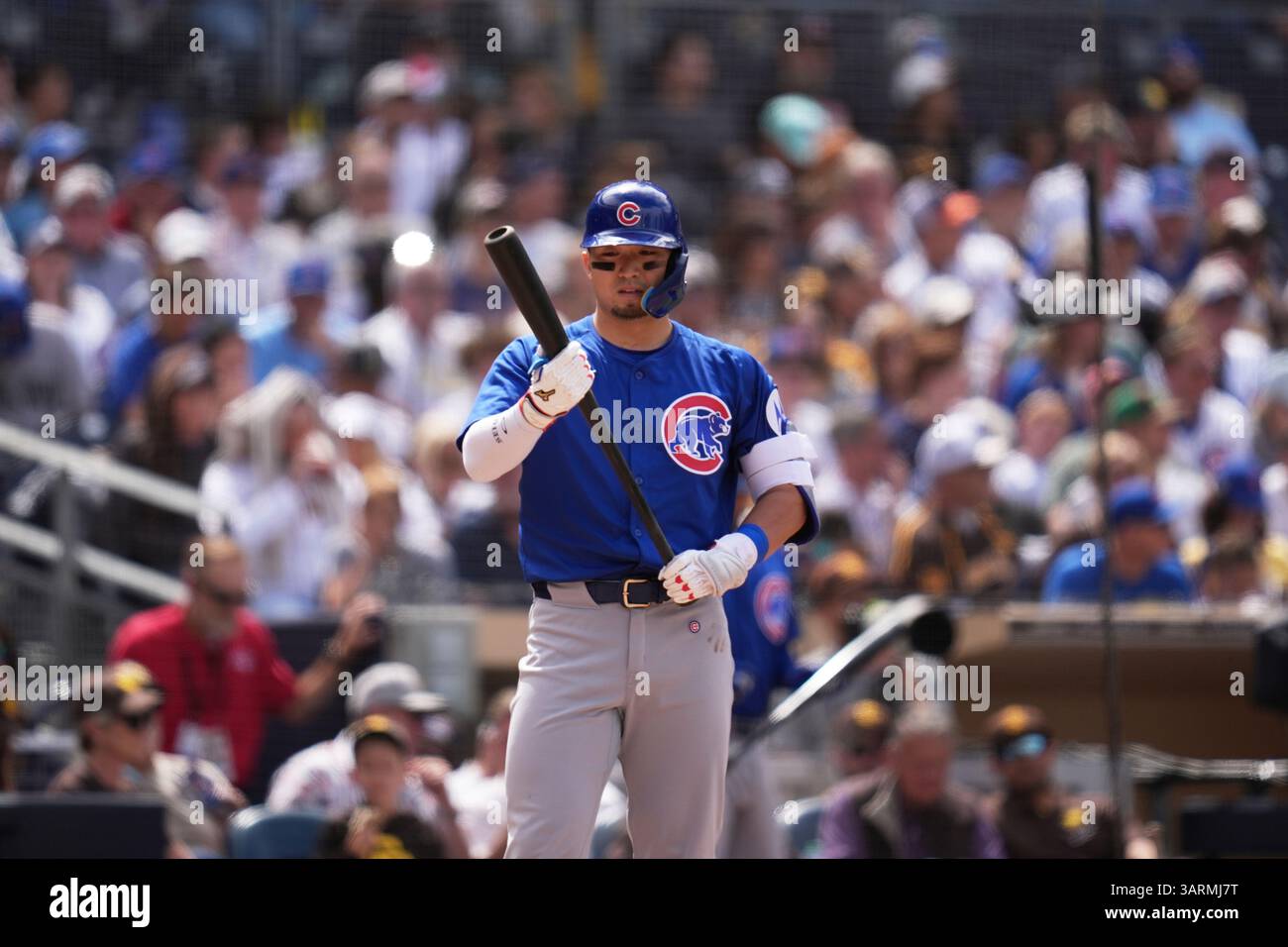 Chicago Cubs' Seiya Suzuki batting watches as he pops out during the ...