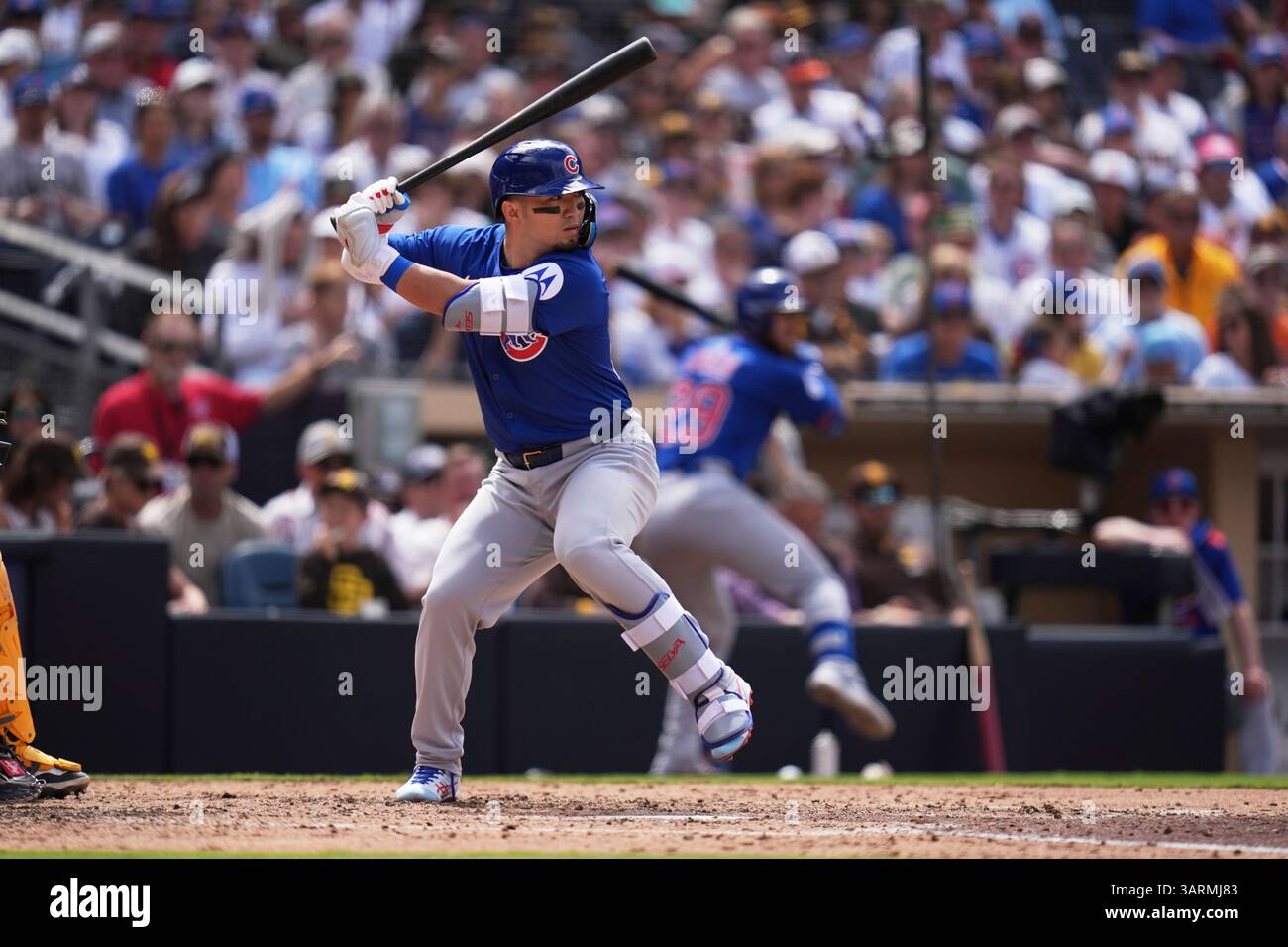 Chicago Cubs' Seiya Suzuki batting watches as he pops out during the ...