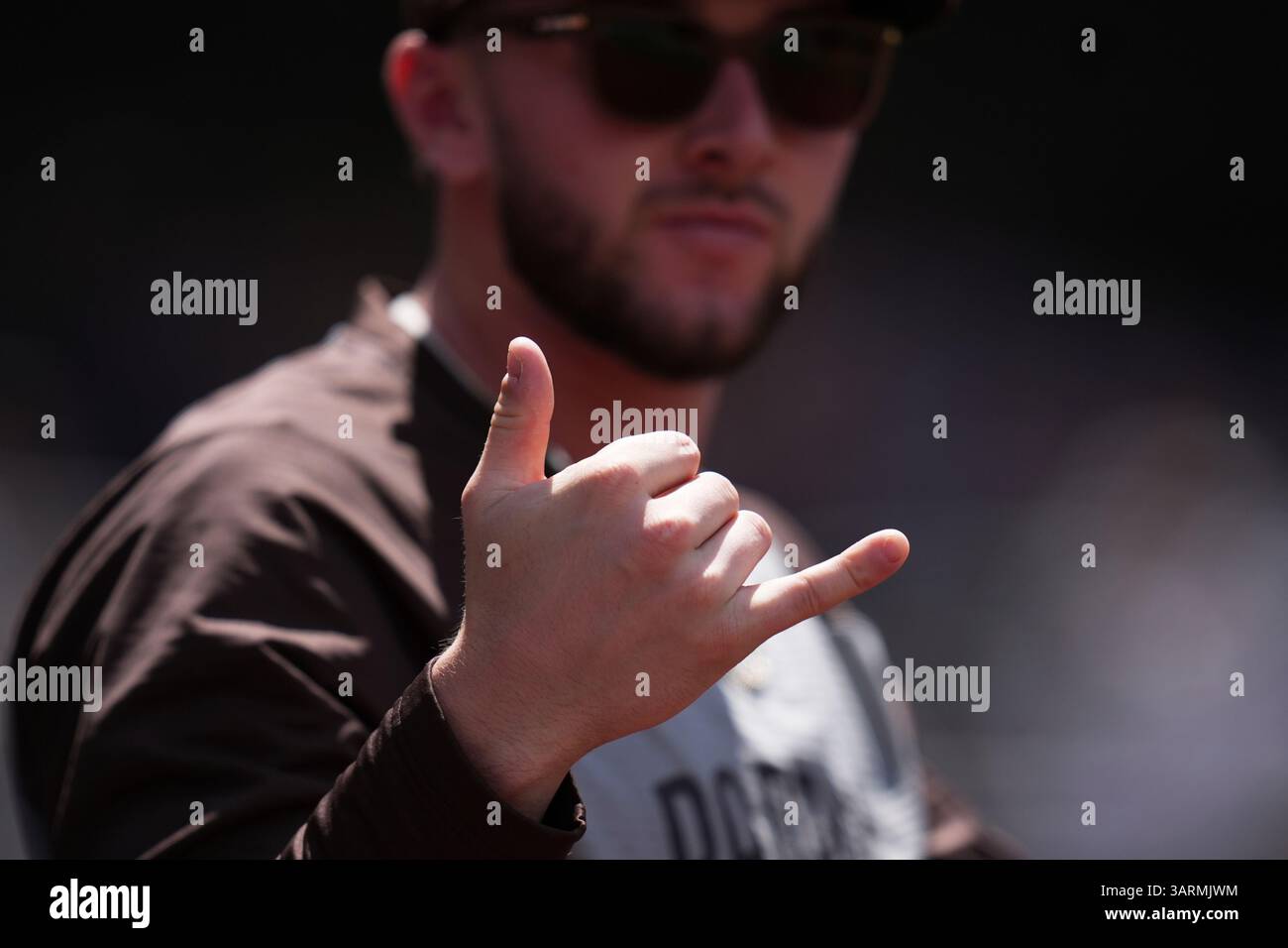 San Diego Padres' Jackson Merrill makes the shaka gesture during the ...