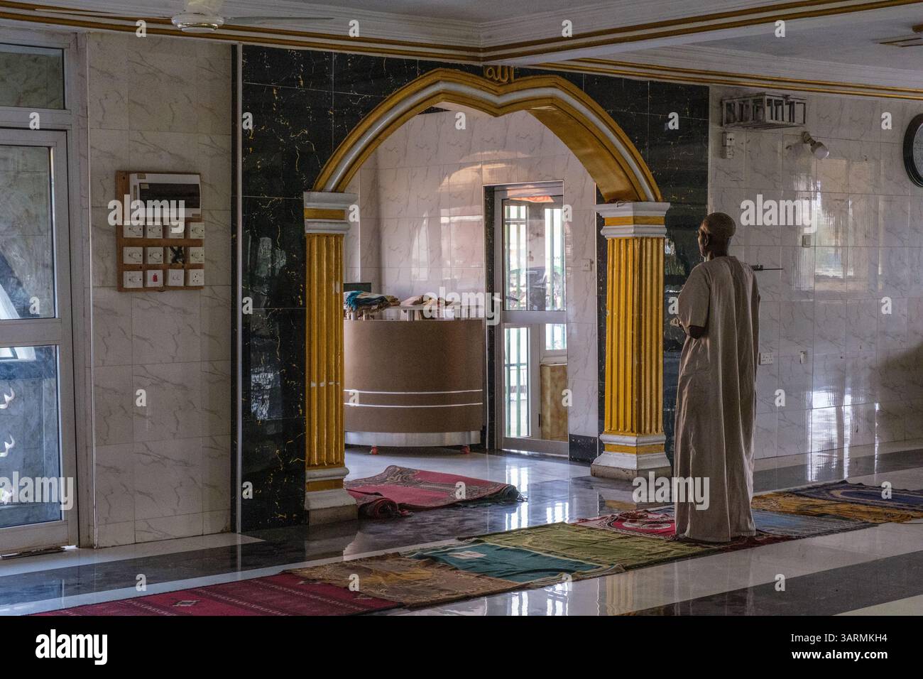 Ghana, Tamale. Worshiper Praying in the Central Mosque Stock Photo - Alamy