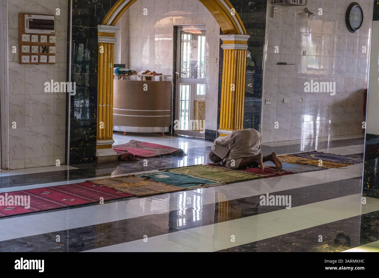 Ghana, Tamale. Worshiper Praying in the Central Mosque Stock Photo - Alamy