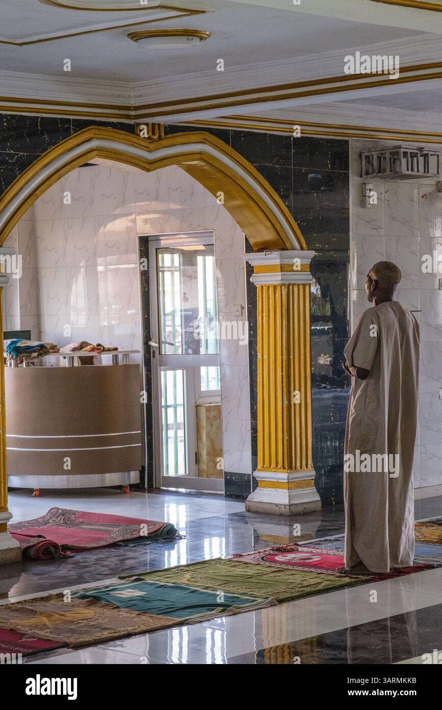 Ghana, Tamale. Worshiper Praying in the Central Mosque Stock Photo - Alamy
