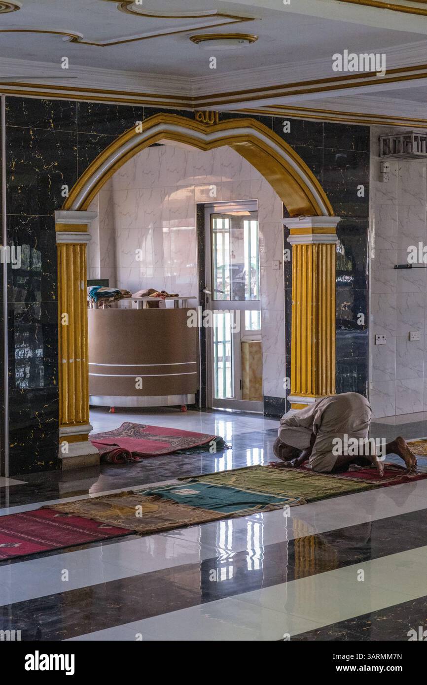 Ghana, Tamale. Worshiper Praying in the Central Mosque Stock Photo - Alamy
