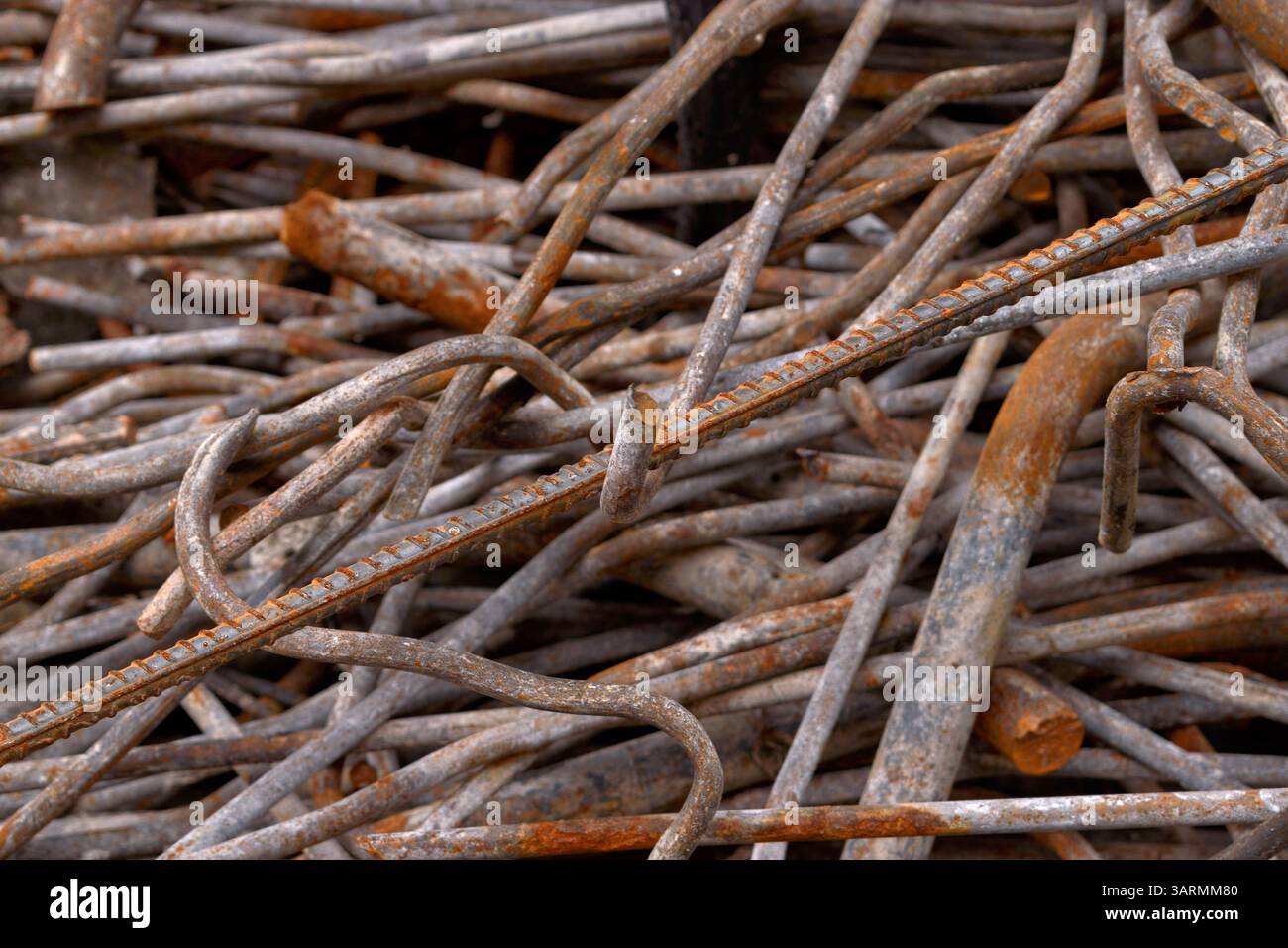 Stack of rusty iron rods or bars Stock Photo - Alamy