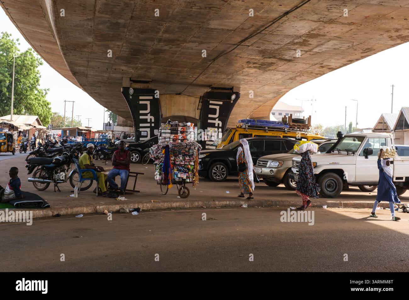 Ghana, Tamale. Street Scene under Highway Overpass Adjacent to the ...