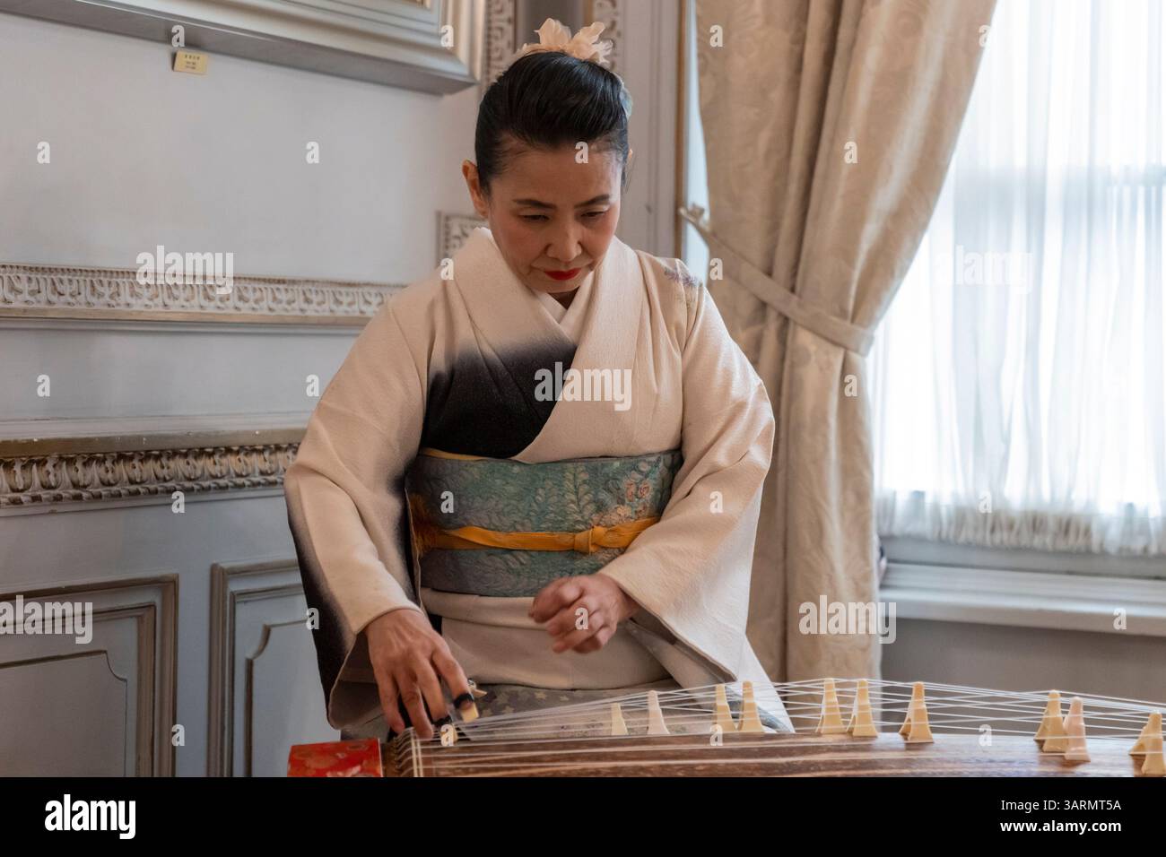 New York, USA. 17th Apr, 2025. Japanese koto player Masayo Ishigure ...