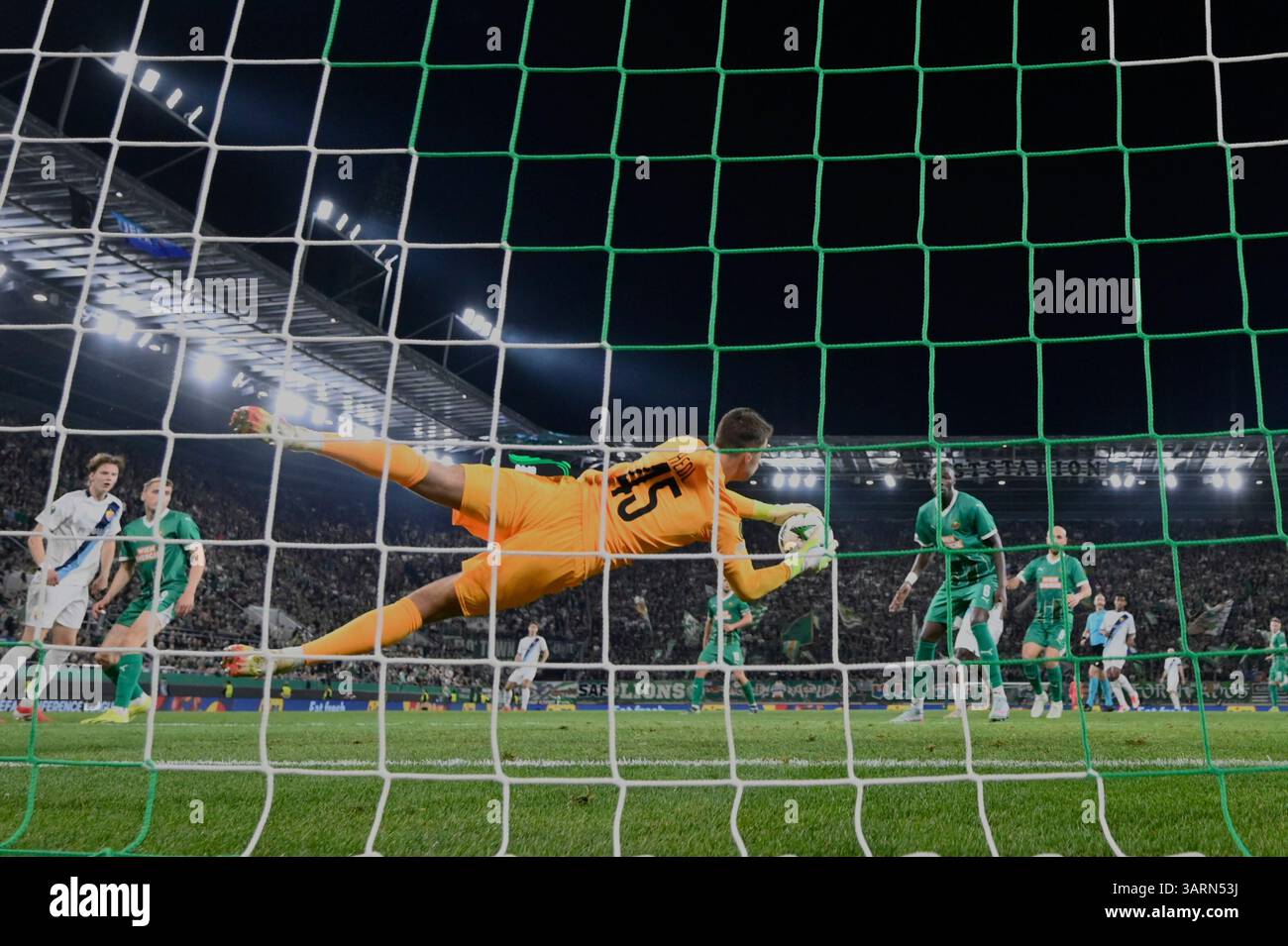 Rapid Wien's goalkeeper Niklas Hedl makes a safe during the Europa ...