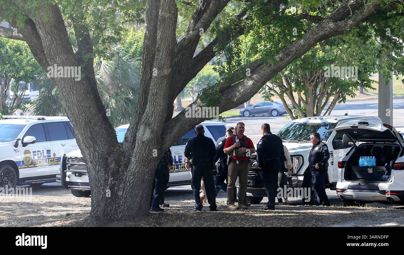 Law enforcement officers gather after a shooting at Florida State ...