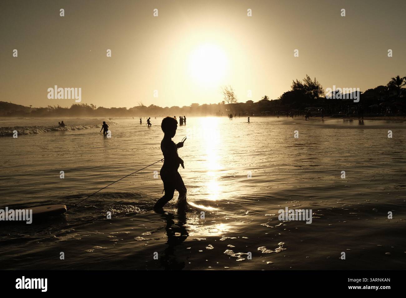 Sunset beach scenes in Buzios, Rio de Janeiro, Brazil Stock Photo - Alamy