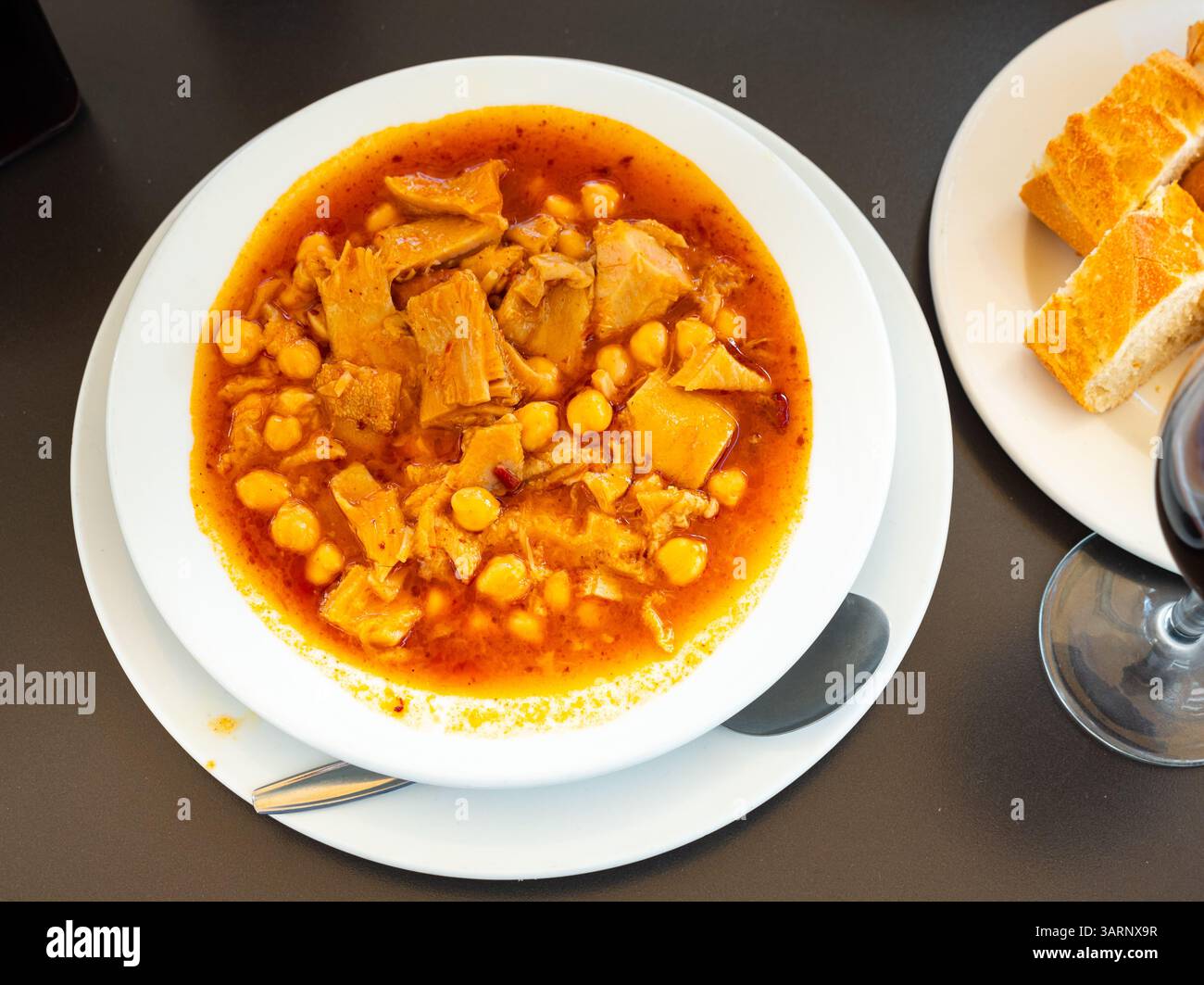 Traditional Spanish dish with chickpeas and meat Stock Photo - Alamy