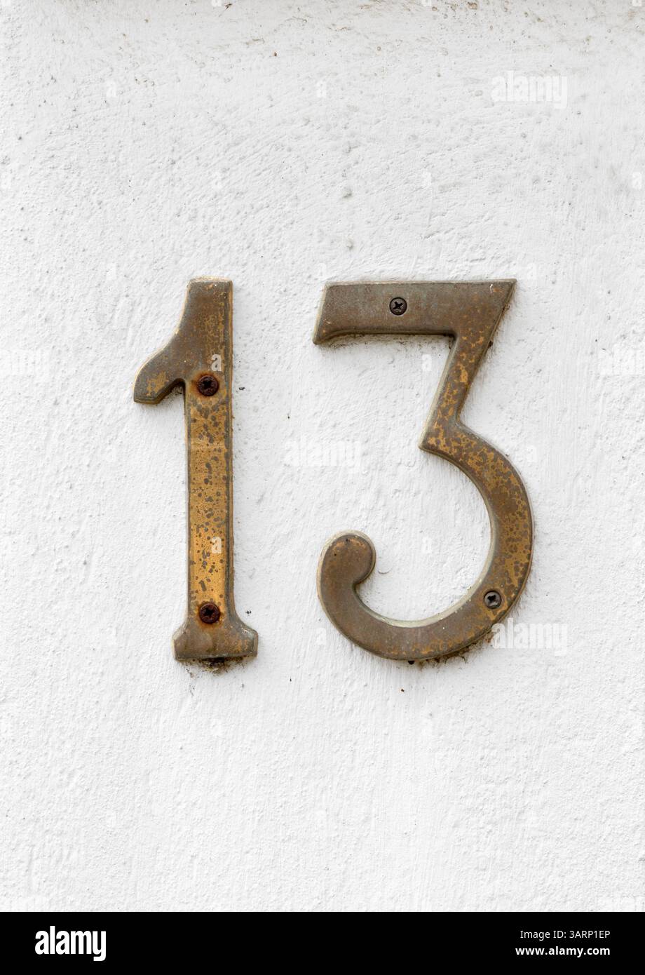 house number 13 on white wall Stock Photo - Alamy
