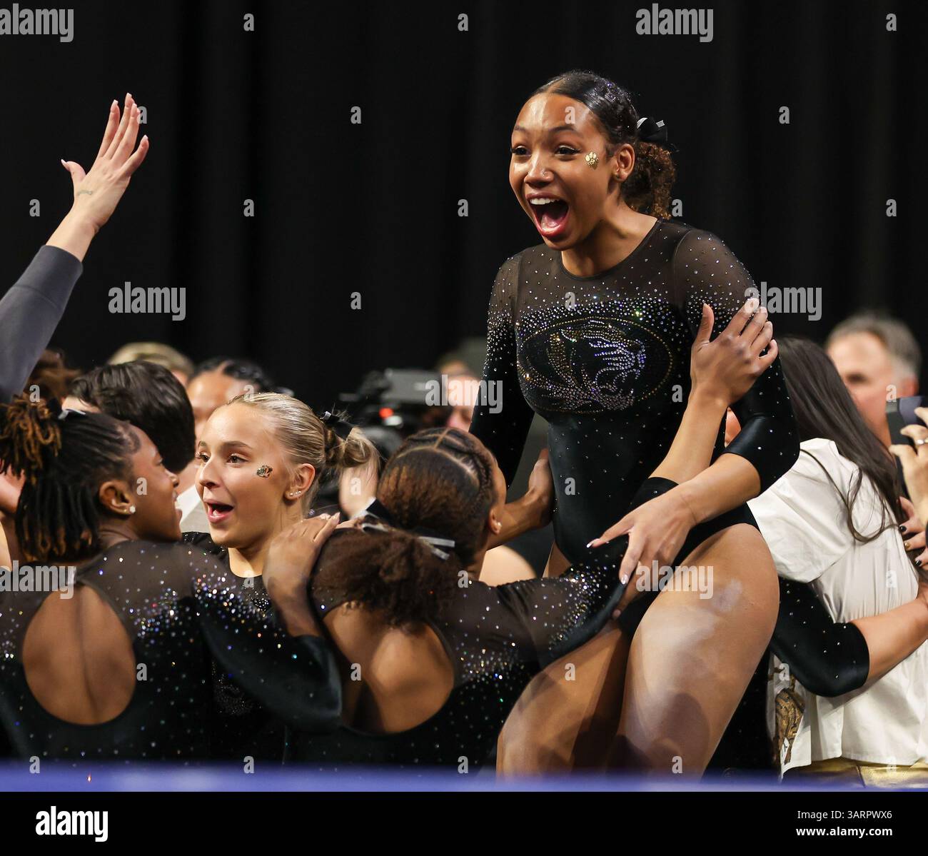 April 17, 2025: The Missouri women's gymnastics team celebrates ...
