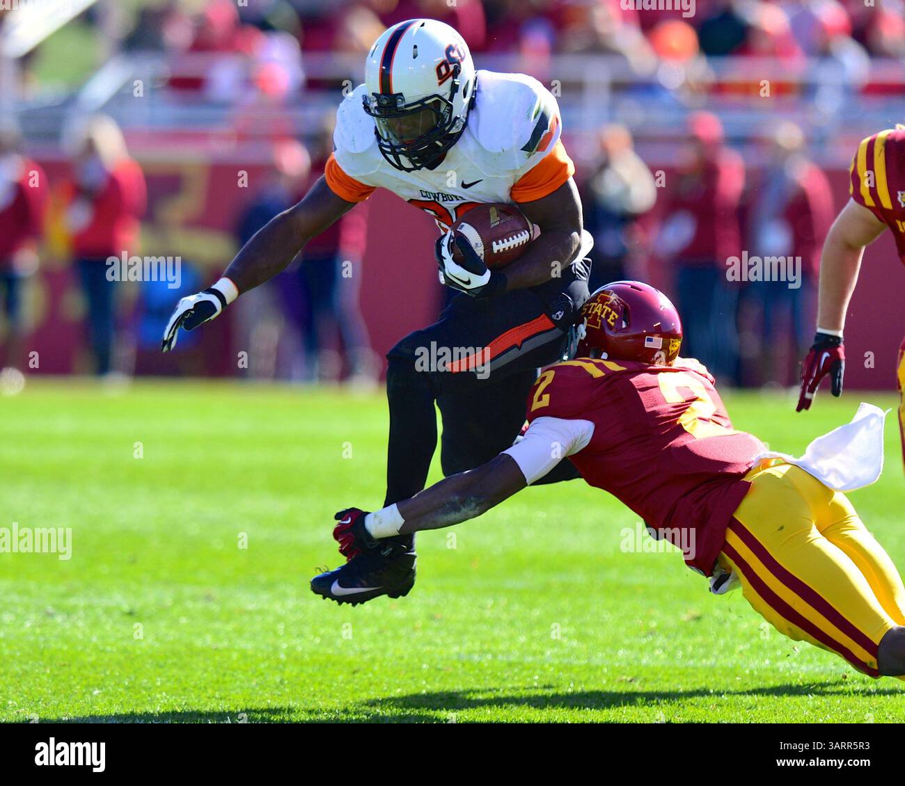 Jumping over a tackle hi-res stock photography and images - Alamy