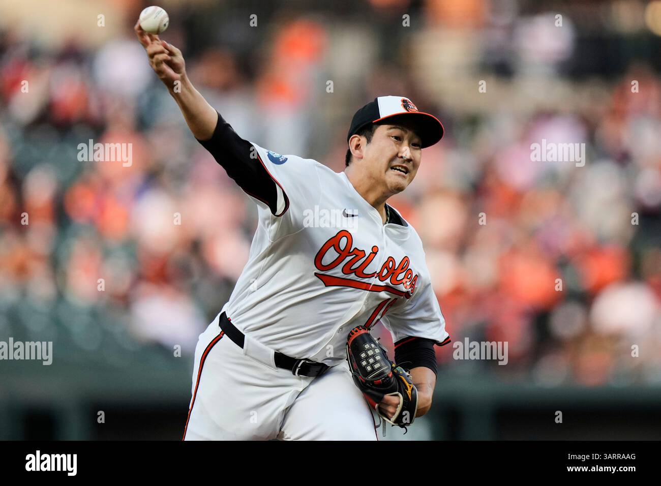 Baltimore Orioles starting pitcher Tomoyuki Sugano delivers during the ...