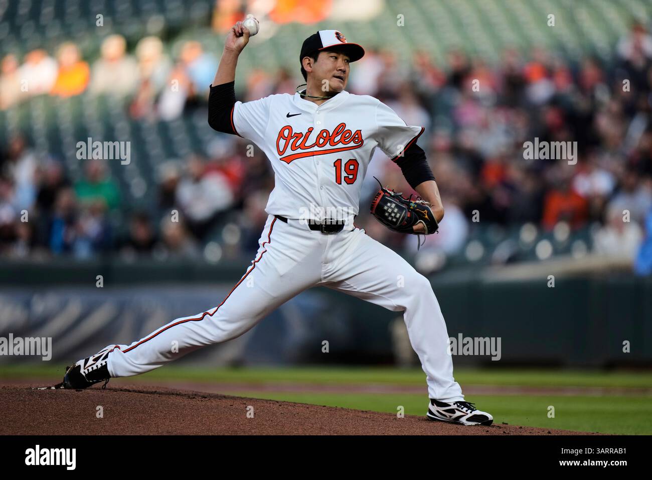 Baltimore Orioles starting pitcher Tomoyuki Sugano delivers during the ...