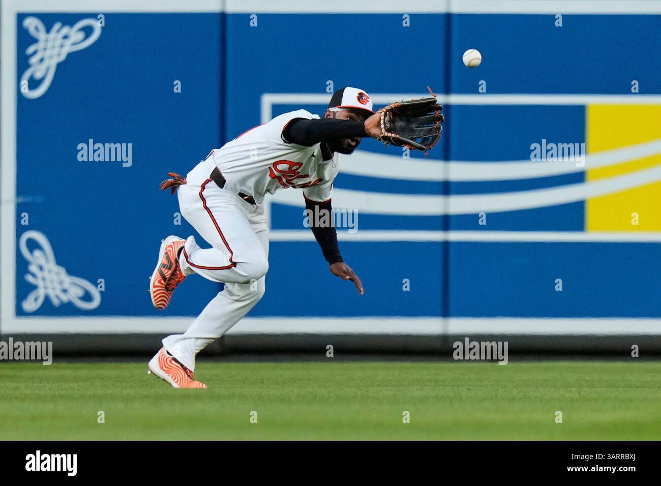 Baltimore Orioles center fielder Cedric Mullins catches a fly ball hit ...