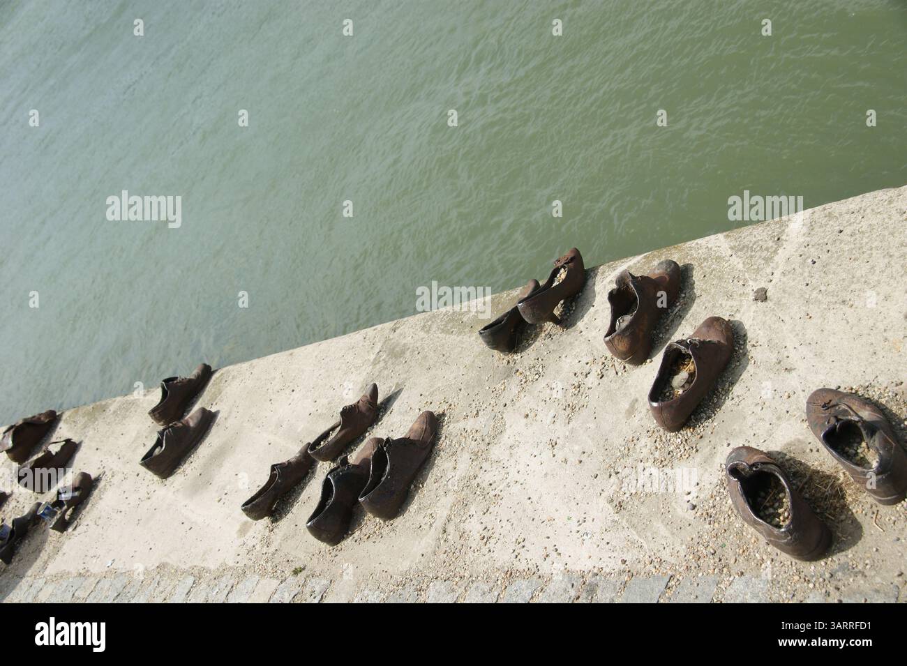 "Shoes on the Danube Bank" memorial in Budapest, Hungary, stands as a ...