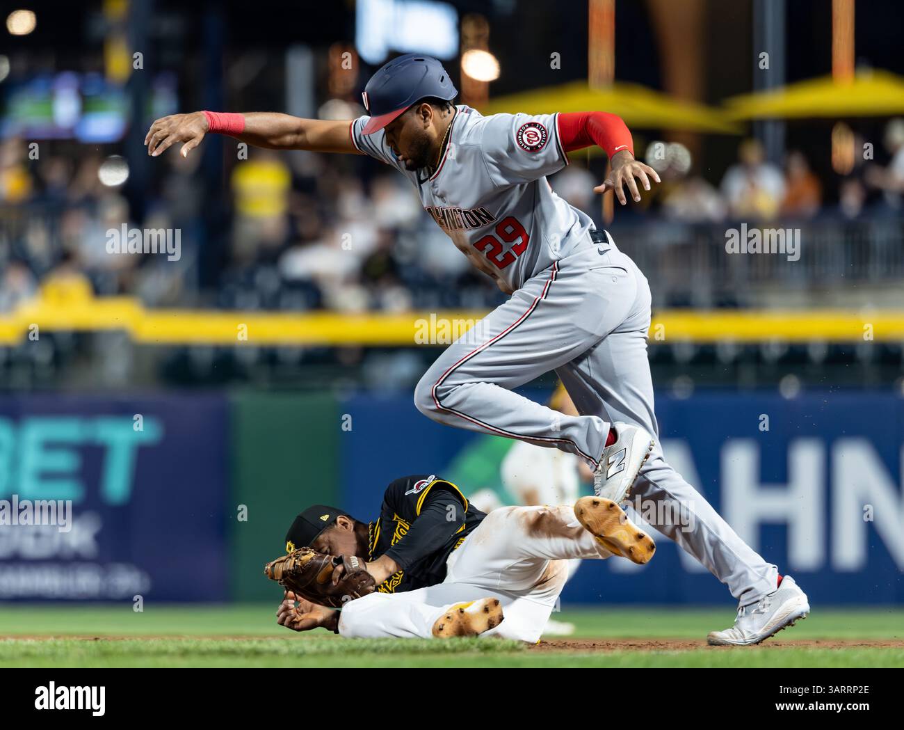 Washington Nationals outfielder James Wood leaps over Pittsburgh ...