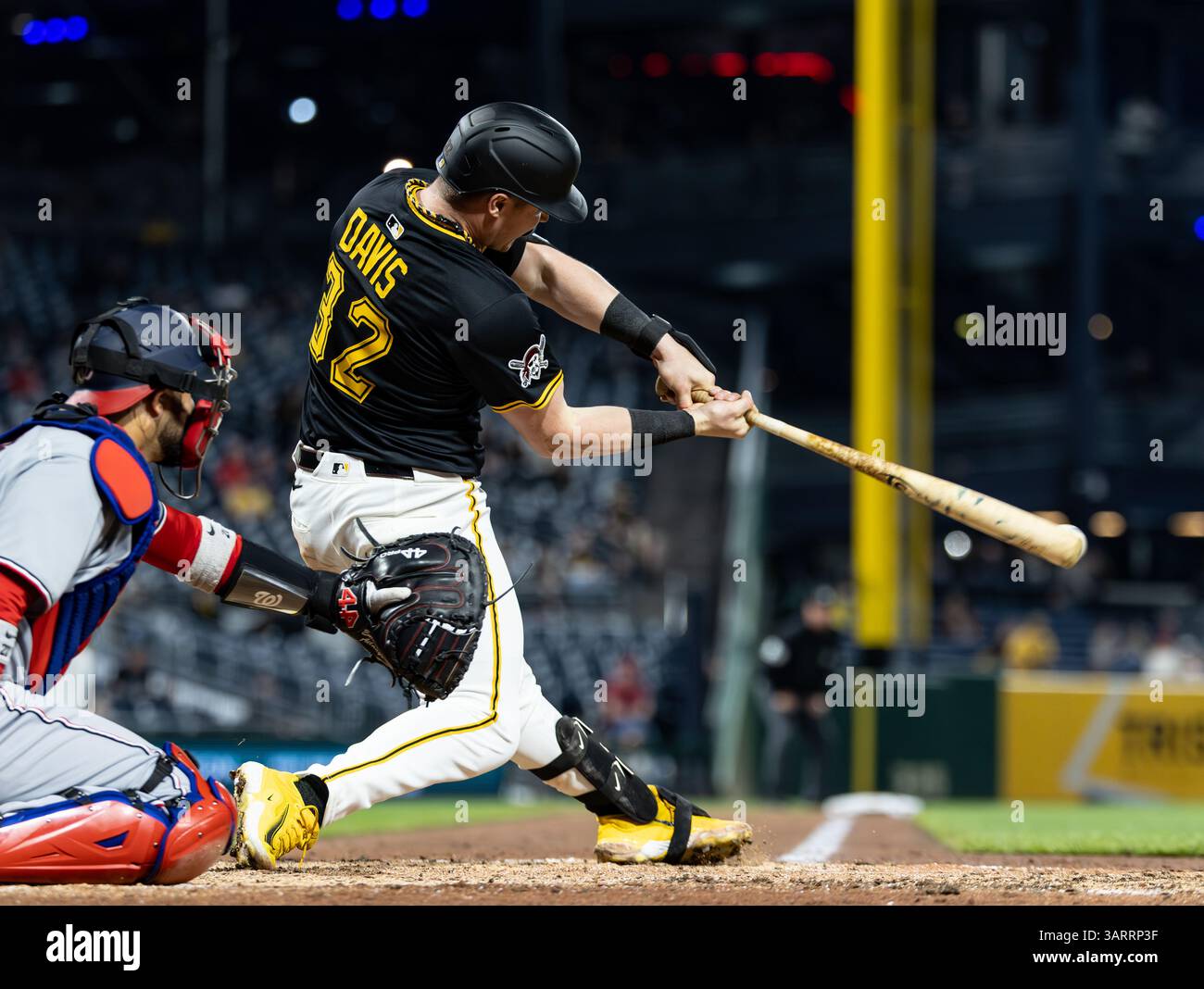 Pittsburgh Pirates catcher Henry Davis makes contact with the pitch at ...