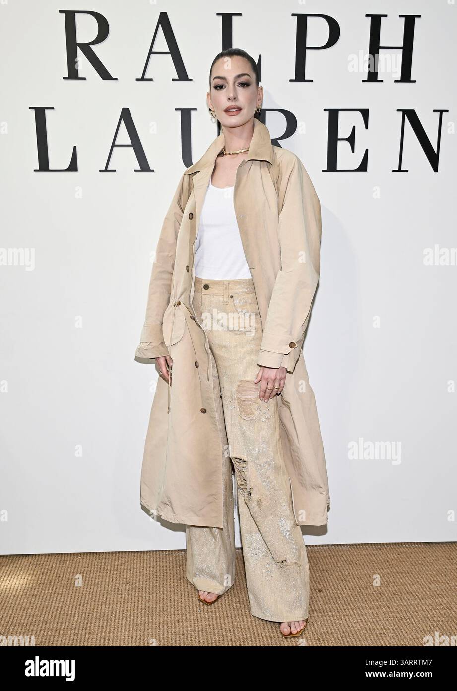 Anne Hathaway attends the Ralph Lauren Fall 2025 presentation on ...
