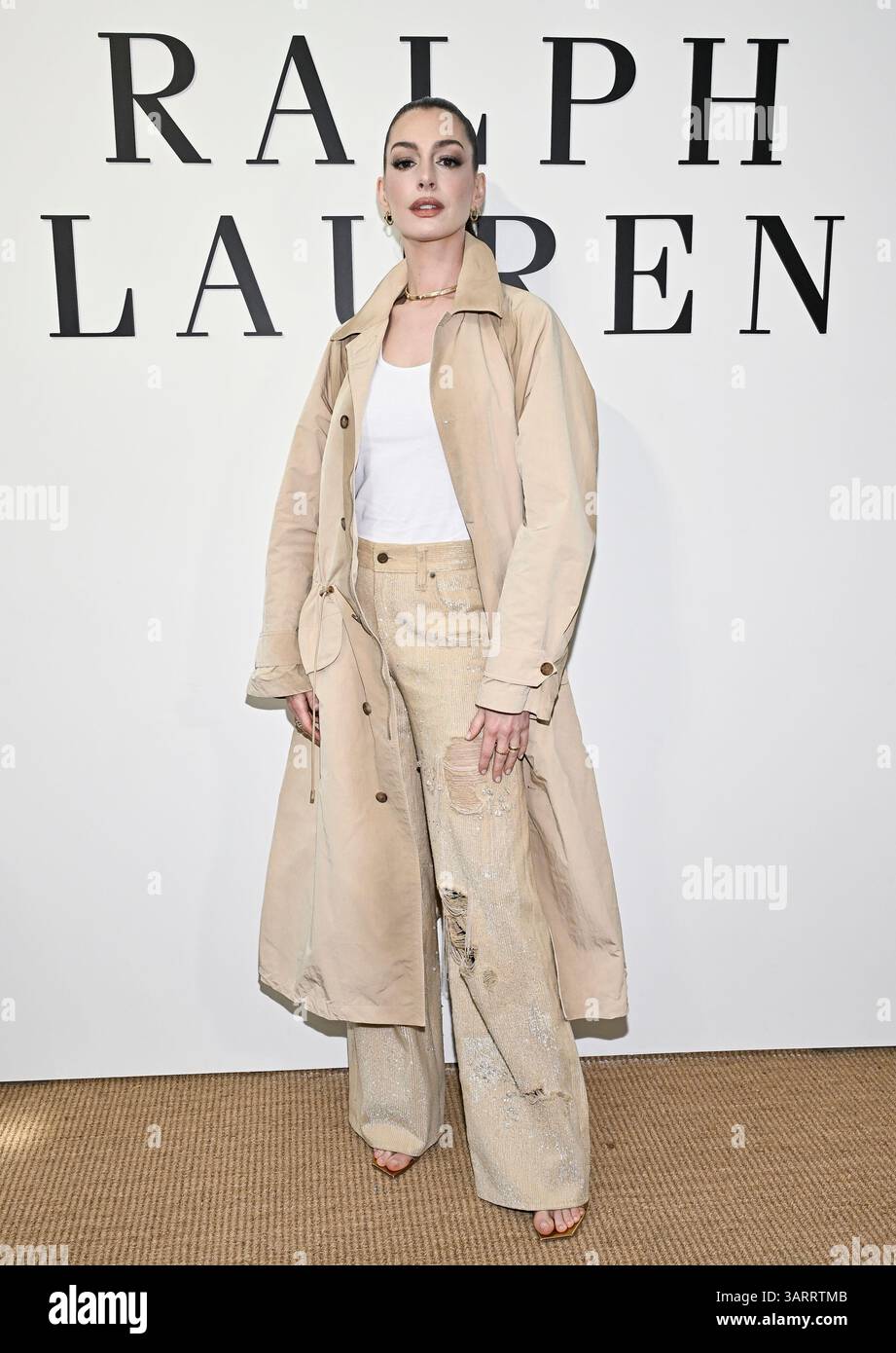 Anne Hathaway attends the Ralph Lauren Fall 2025 presentation on ...