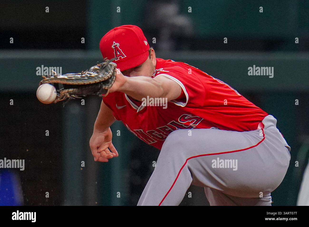 Los Angeles Angels first baseman Nolan Schanuel drops a throw as Texas ...