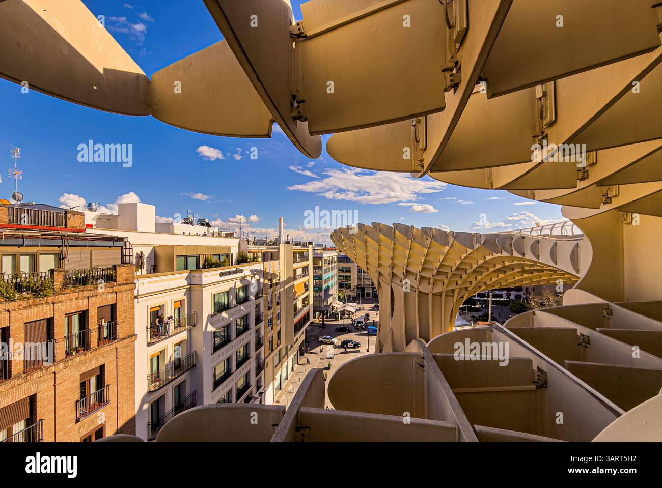 Modern architecture of Metropol Parasol framing traditional Seville ...