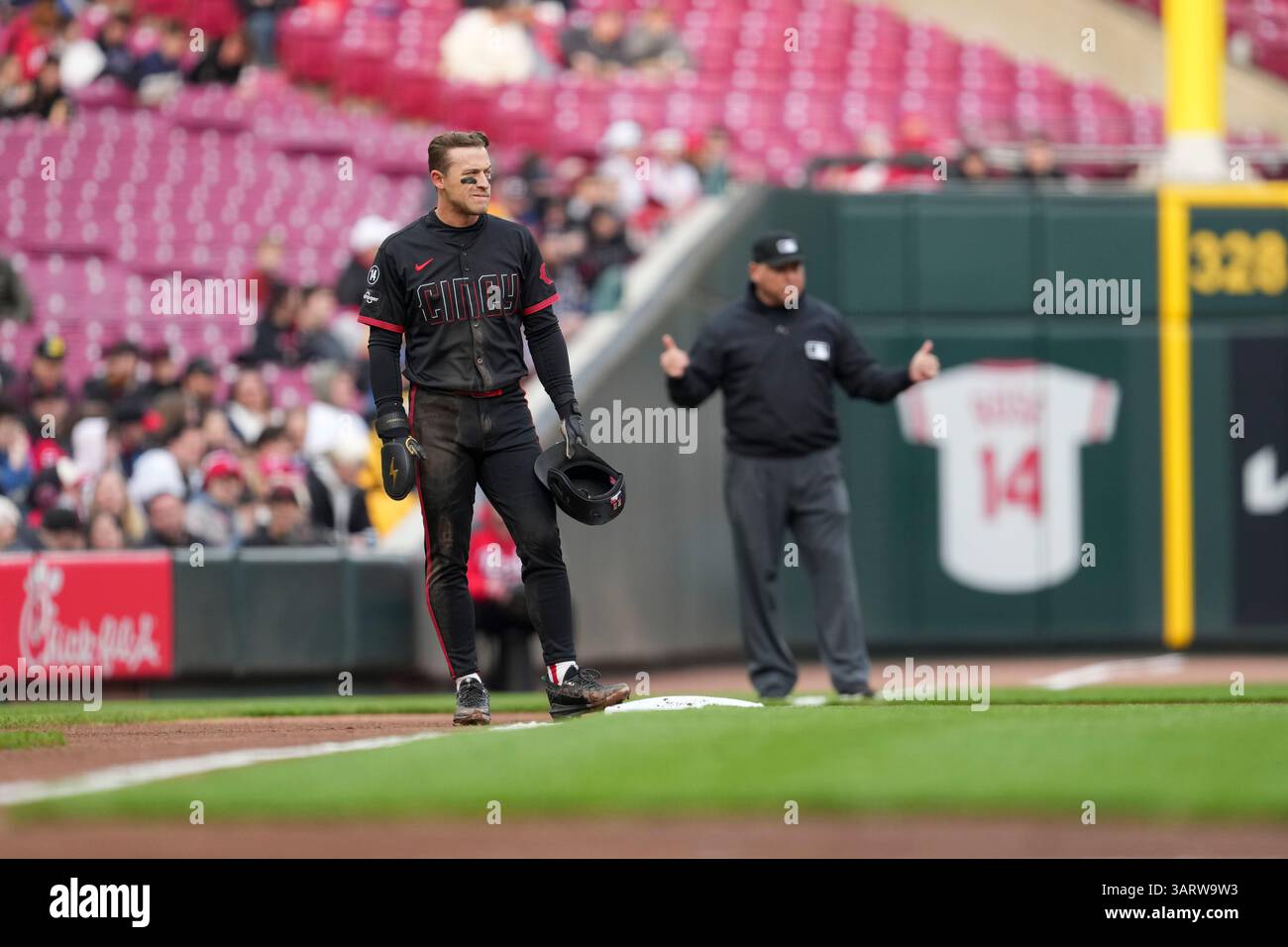 Cincinnati Reds' TJ Friedl looks on during a baseball game against the ...