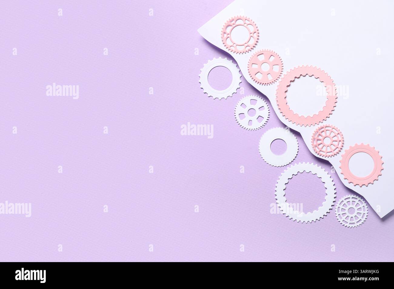 Different paper gears on colorful background Stock Photo - Alamy