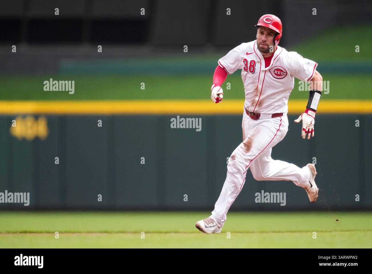 Cincinnati Reds' Austin Wynns rounds the bases during a baseball game ...