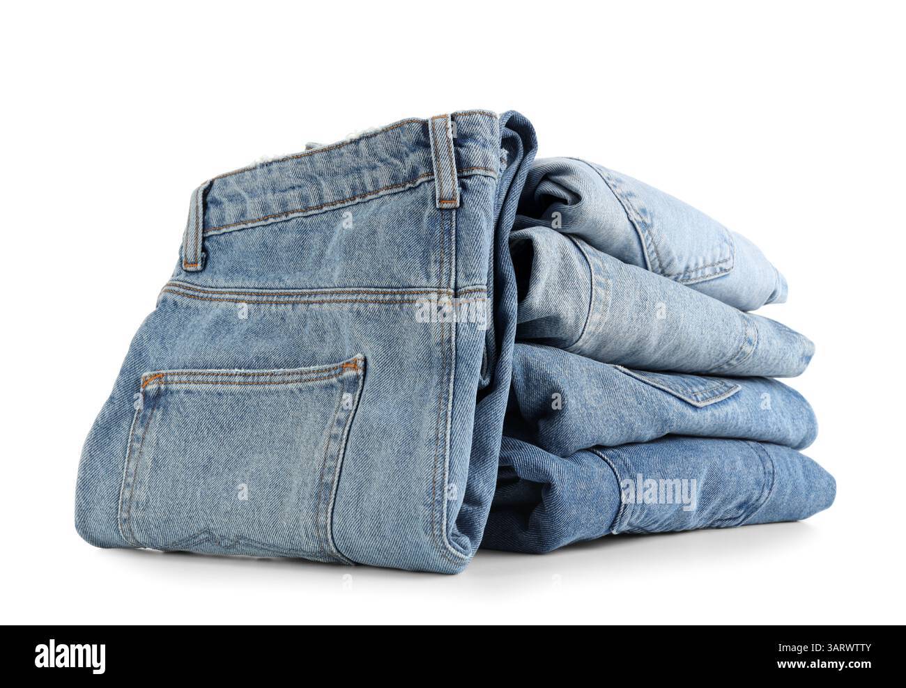 Stack of clean jeans pants isolated on white background Stock Photo - Alamy