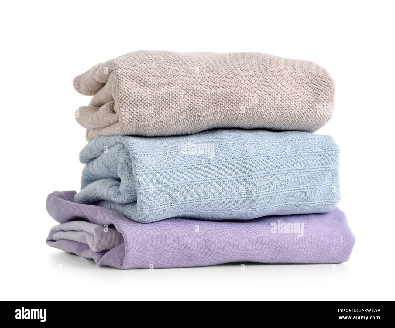 Stack of clean folded clothes isolated on white background Stock Photo ...