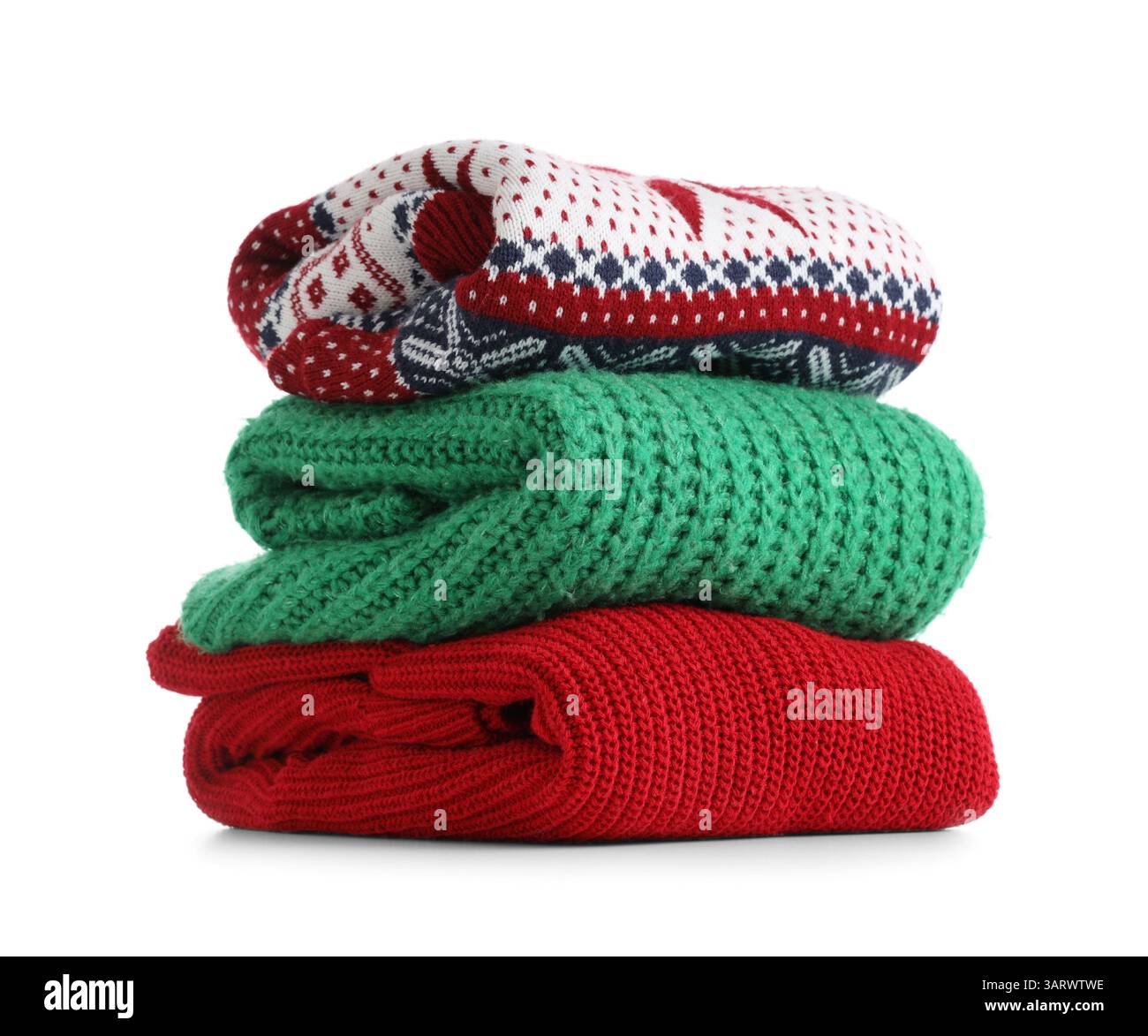 Stack of clean sweaters isolated on white background Stock Photo - Alamy