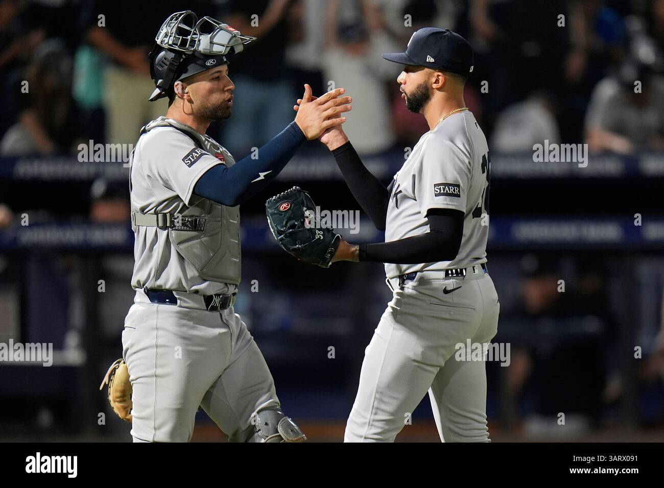 New York Yankees pitcher Devin Williams, right, celebrates with catcher ...
