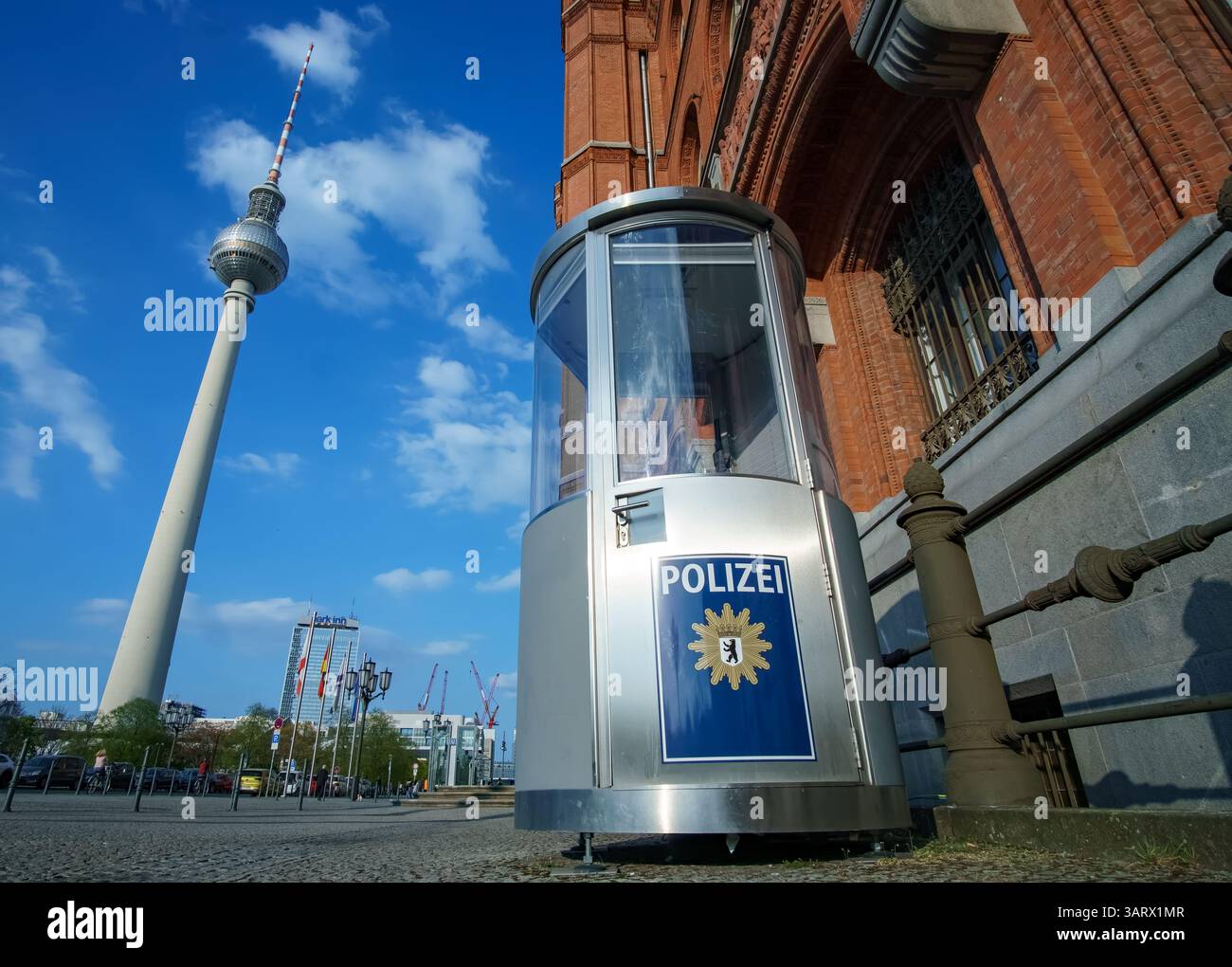 Police guard booth in front of Berlin’s Red City Hall, with the iconic ...