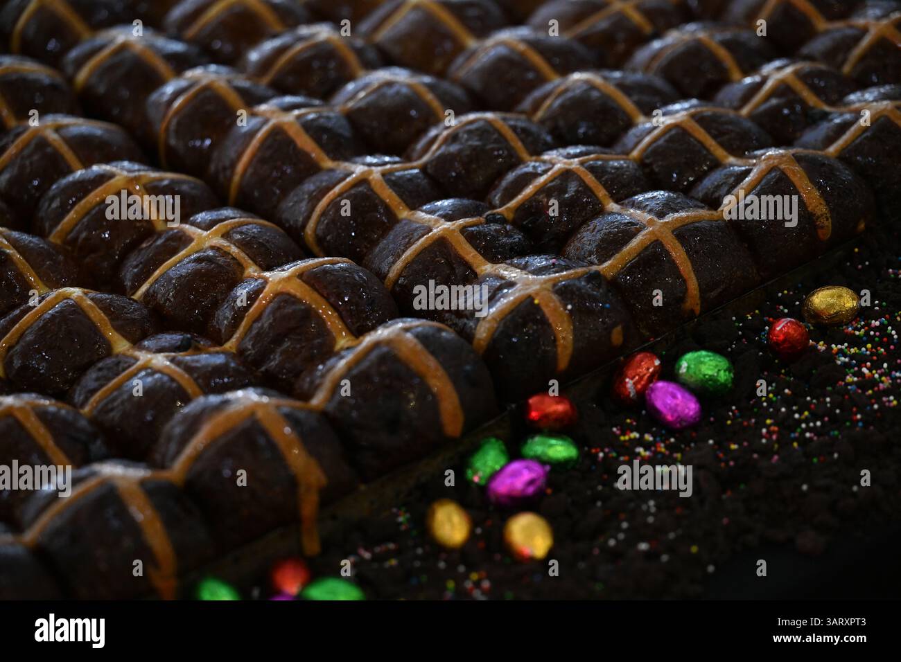 Melbourne, Australia. 18th Apr, 2025. Easter eggs and hot cross buns ...