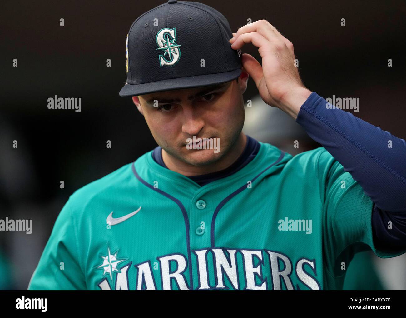 Seattle Mariners' Ben Williamson walks through the dugout during a ...