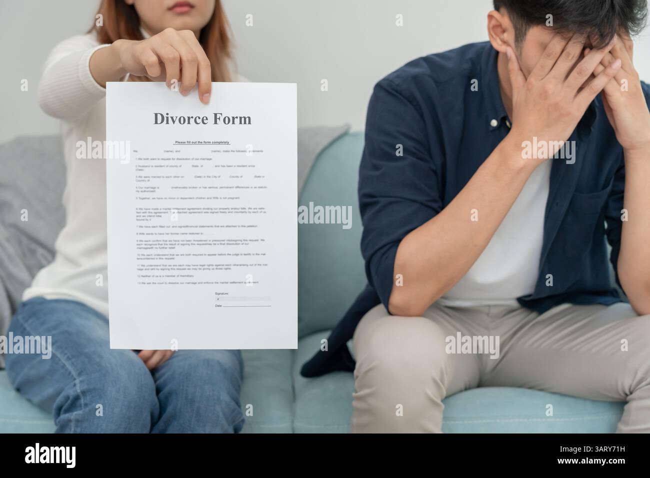 Divorce. Woman review and sign Divorce form. Couples desperate and ...