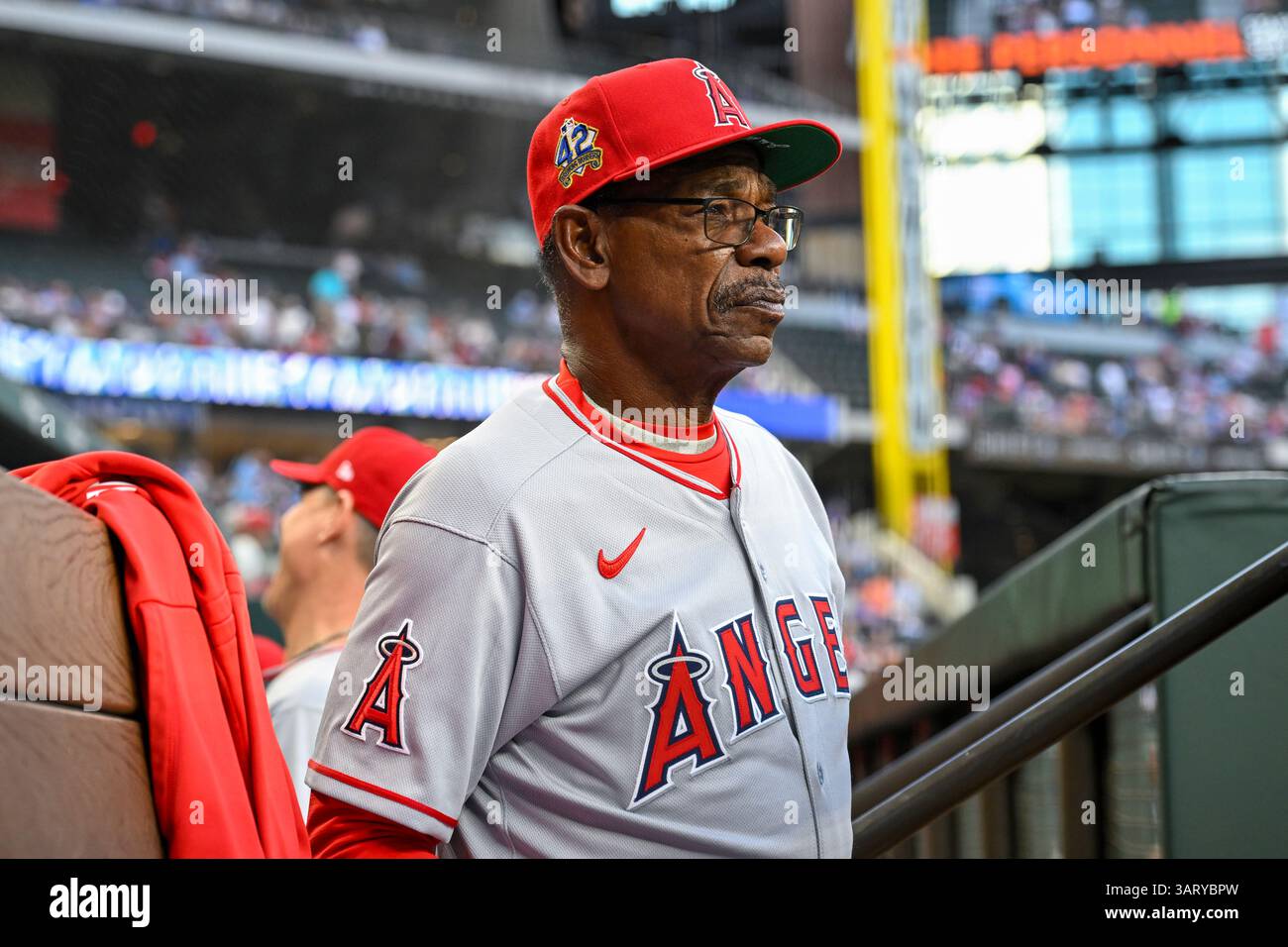 Los Angeles Angels manager Ron Washington wears a cap with an emblem ...