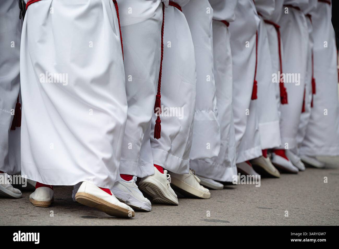 Madrid, Spain. 17th Apr, 2025. Participants' feet seen during a Holy ...