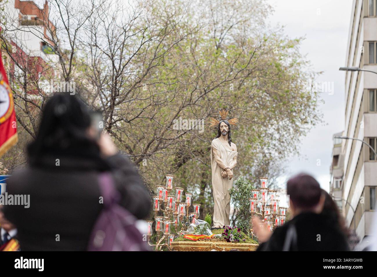Madrid, Spain. 17th Apr, 2025. Faithful spectators watch and photograph ...