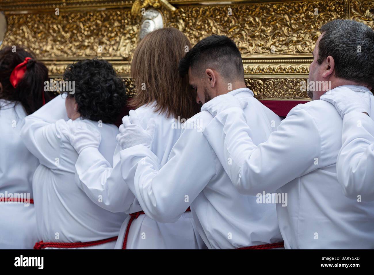Madrid, Spain. 17th Apr, 2025. Close-up view of a group of costaleros ...