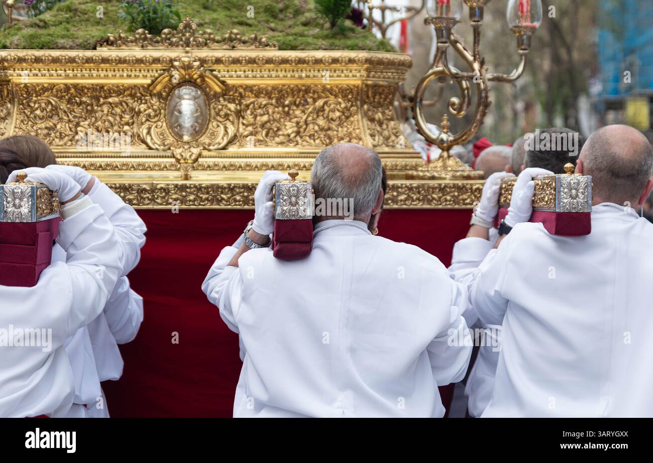 Madrid, Spain. 17th Apr, 2025. Close-up view of a group of costaleros ...