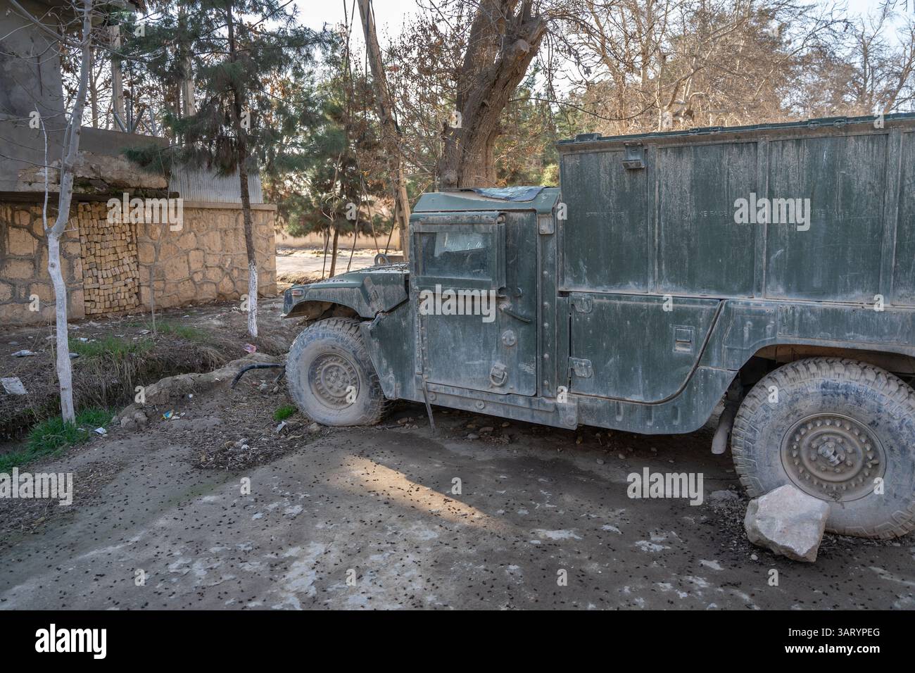 a bullet-riddled, crashed military vehicle in the area of the Green ...