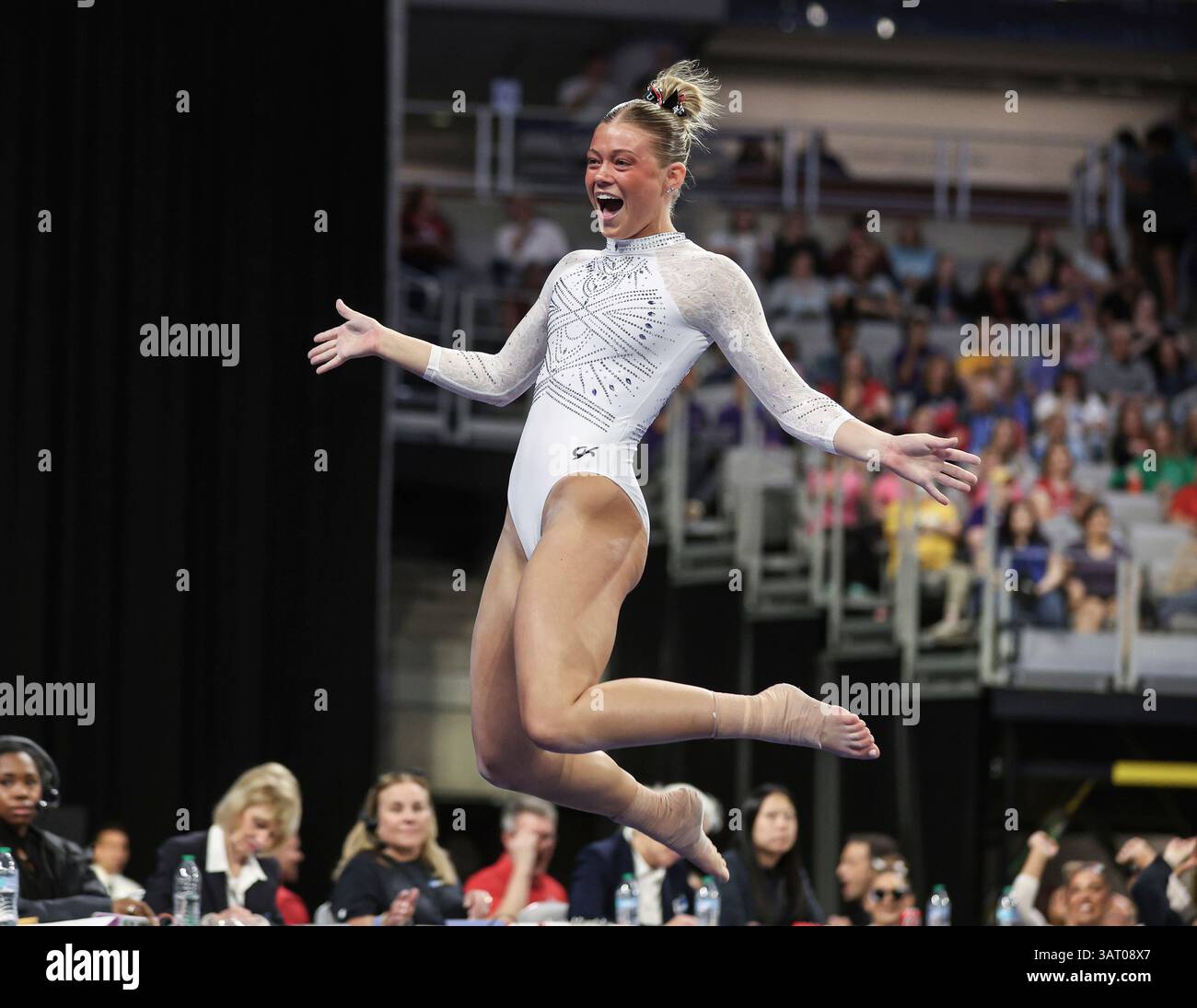 April 17, 2025: Utah's Avery Neff celebrates after her beam routine ...